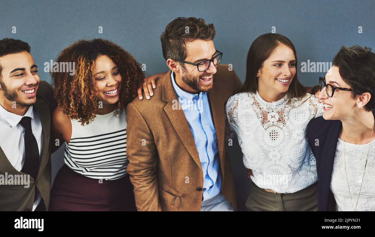 Stand together and watch each other grow. Studio shot of a group of ...
