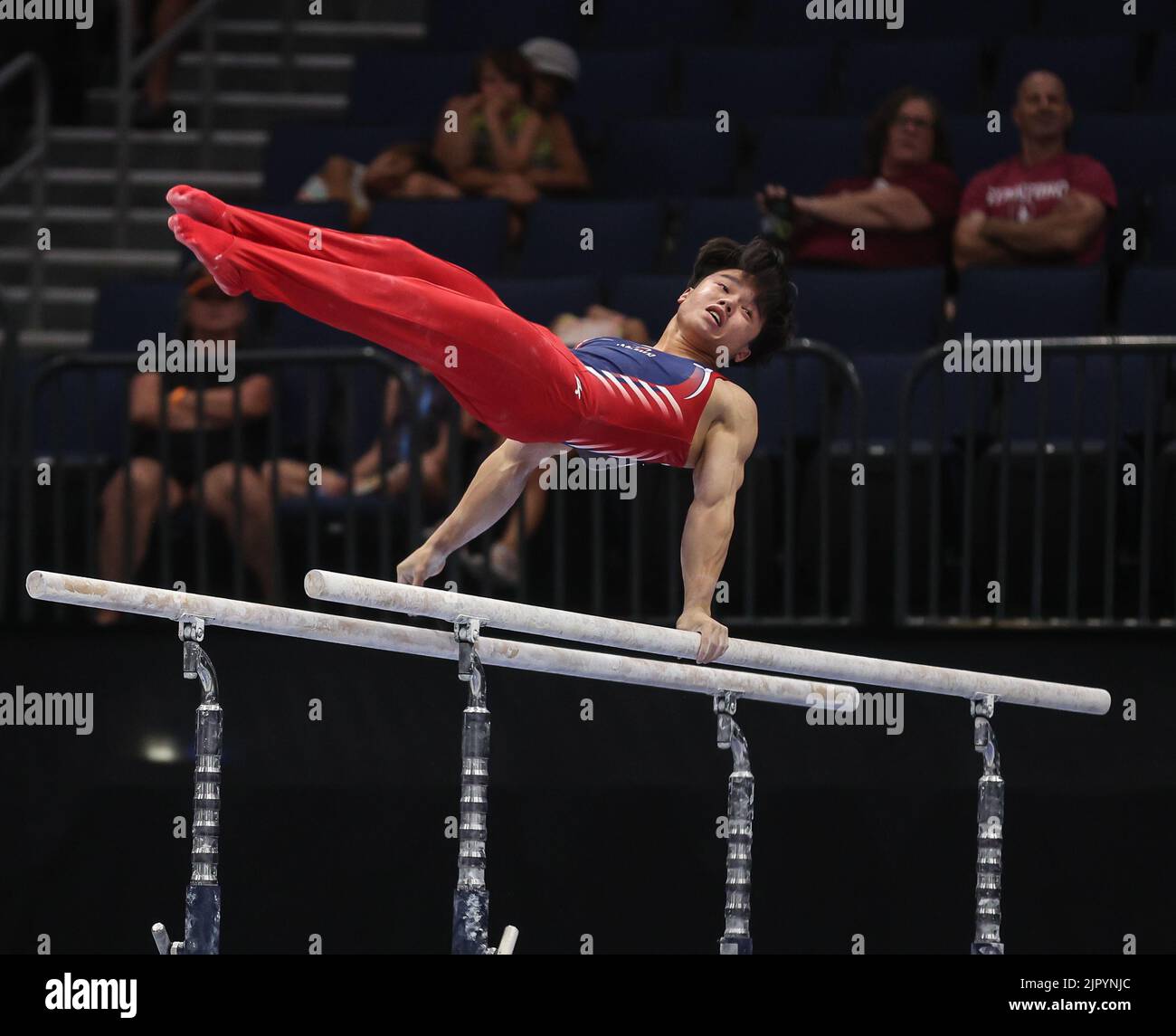 August 20, 2022: Asher Hong competes on the parallel bars during the ...