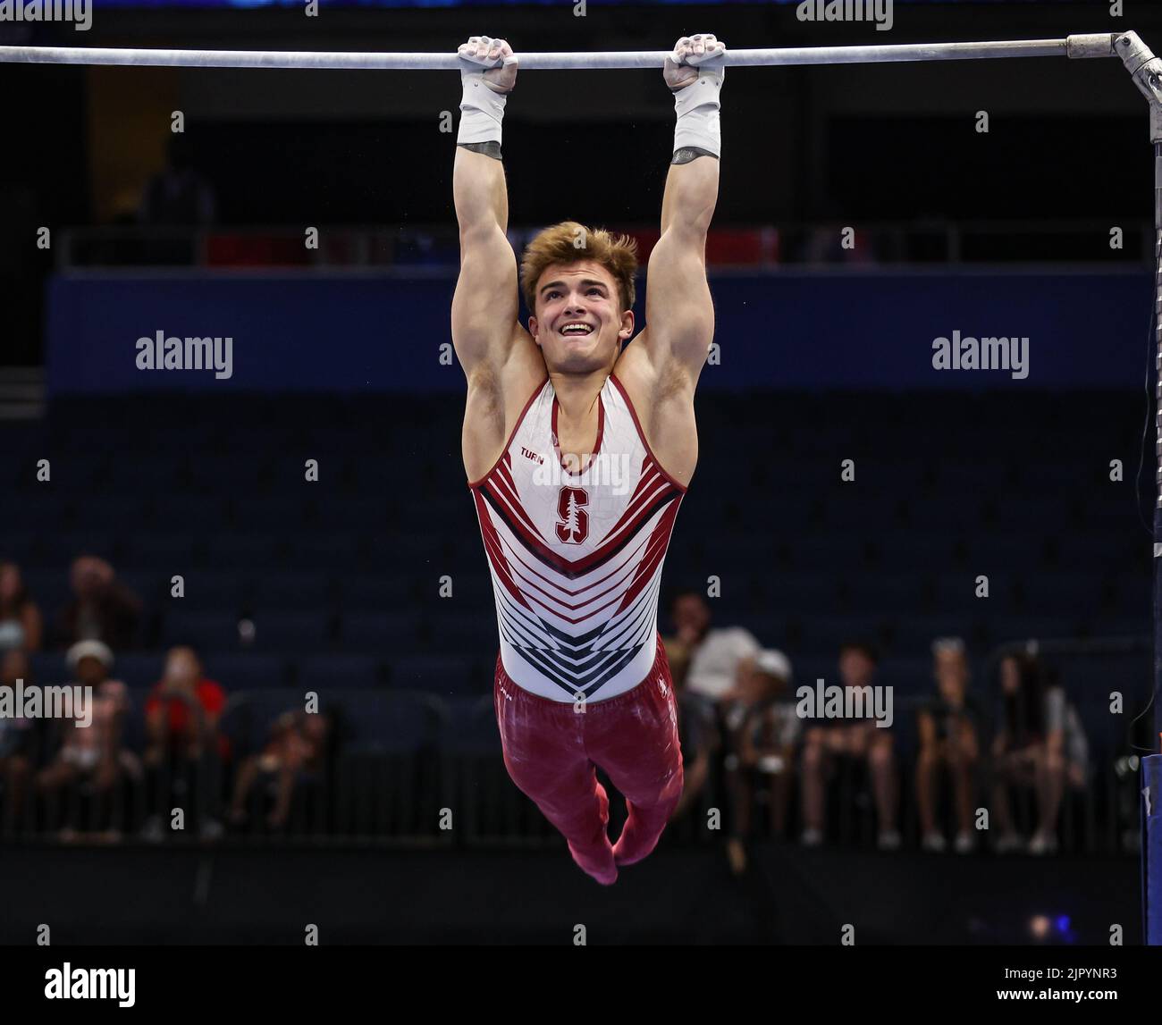 August 20, 2022: Curran Phillips of Stanford competes on high bar ...
