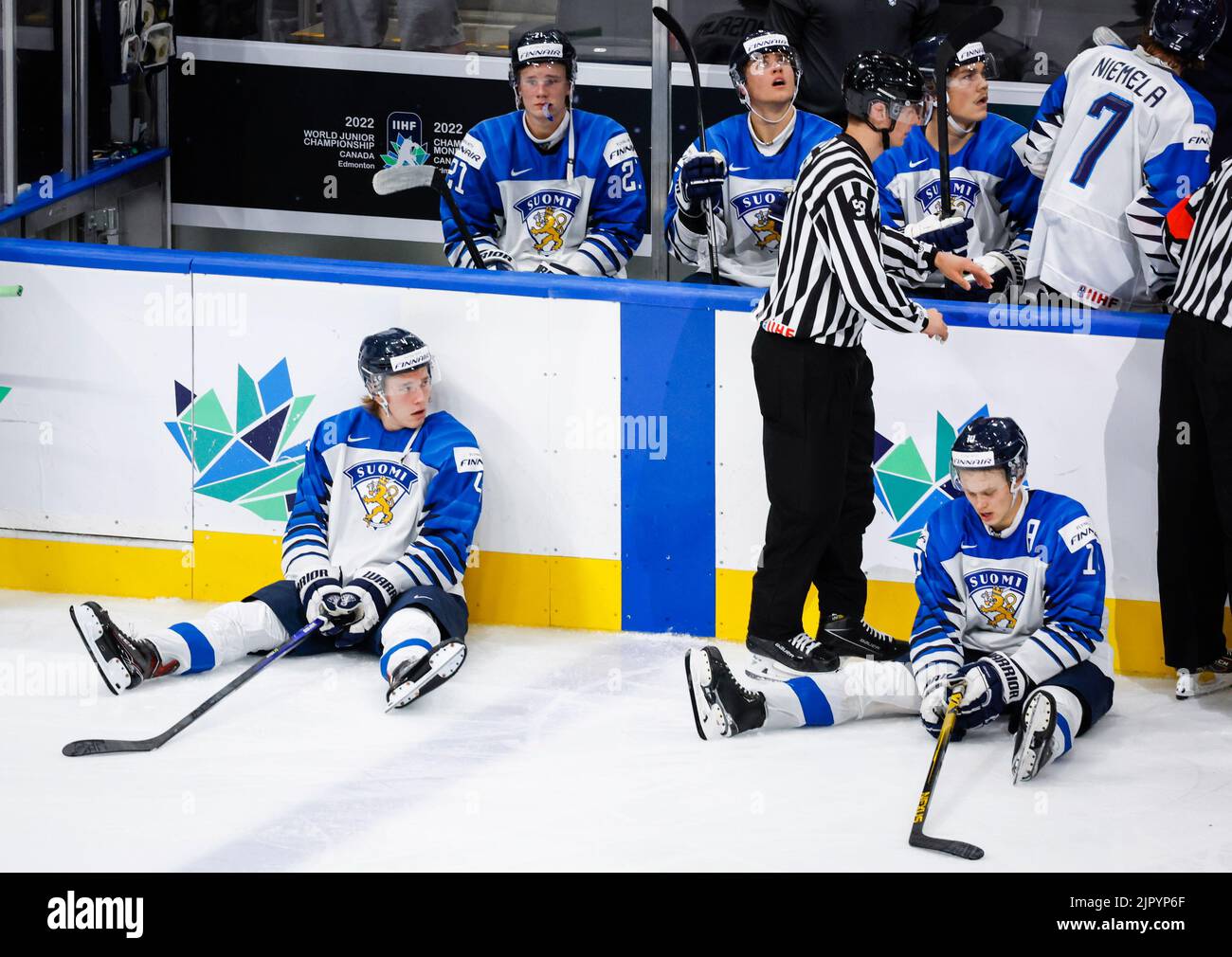 Finland defenceman Joni Jurmo, left, and defenceman Kasper Puutio react ...