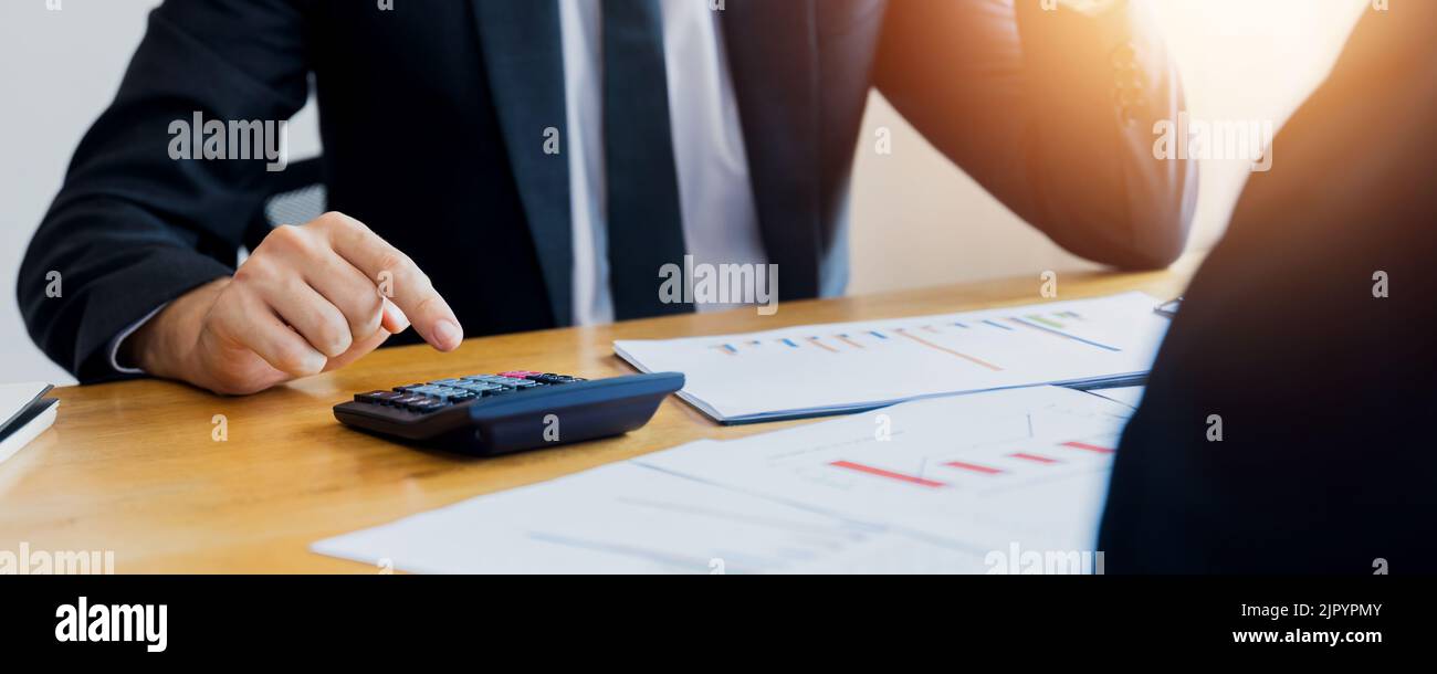 financial business man check and analysis on finance paperwork Stock ...