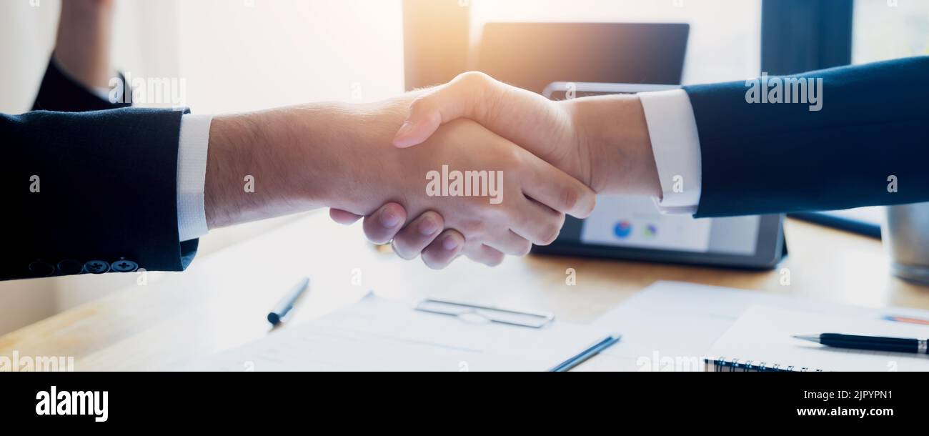 Success and teamwork cooperate concept, two business man shake hand ...