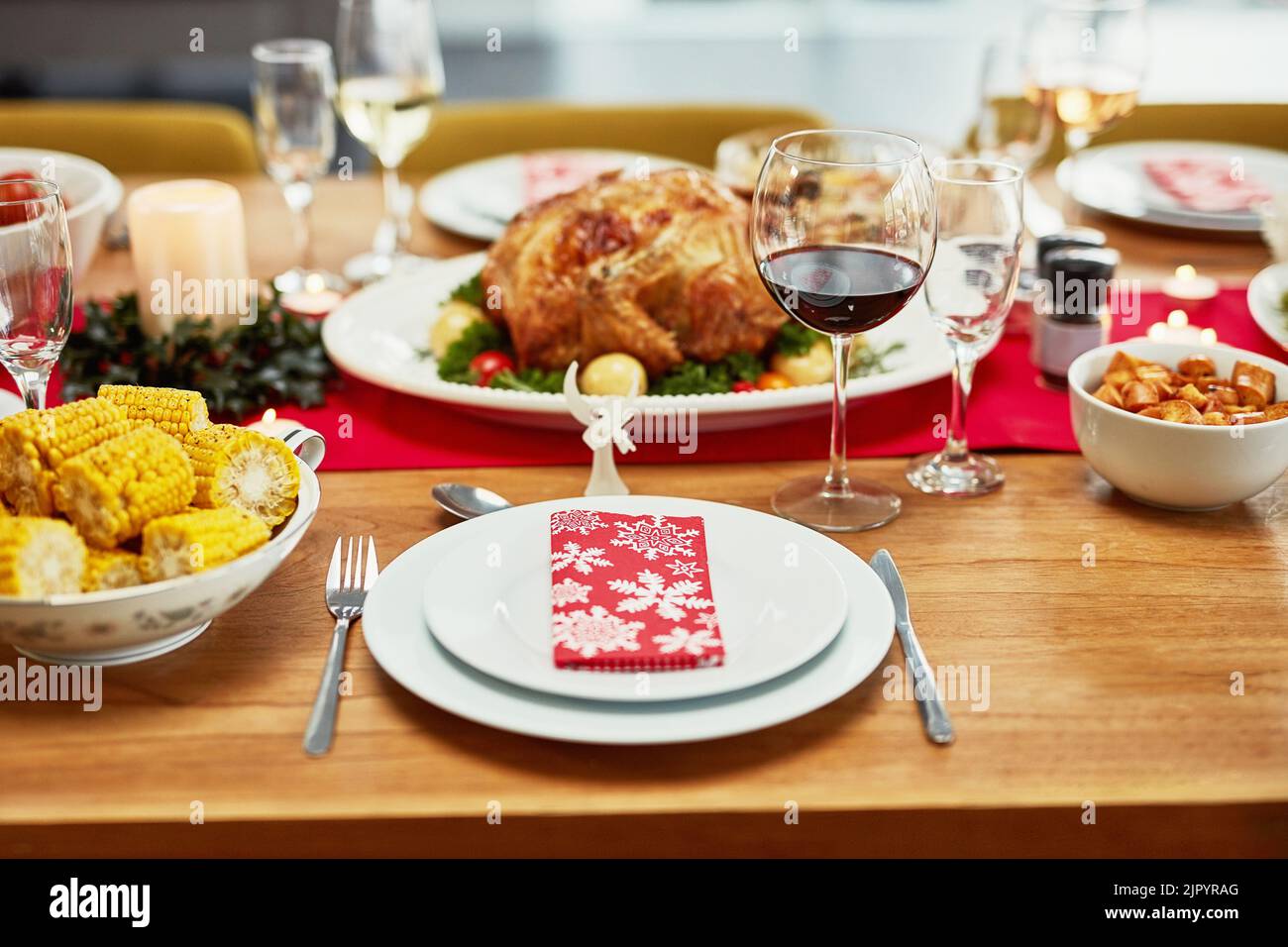 Please join us for dinner. a feast on a dining table with no people at ...