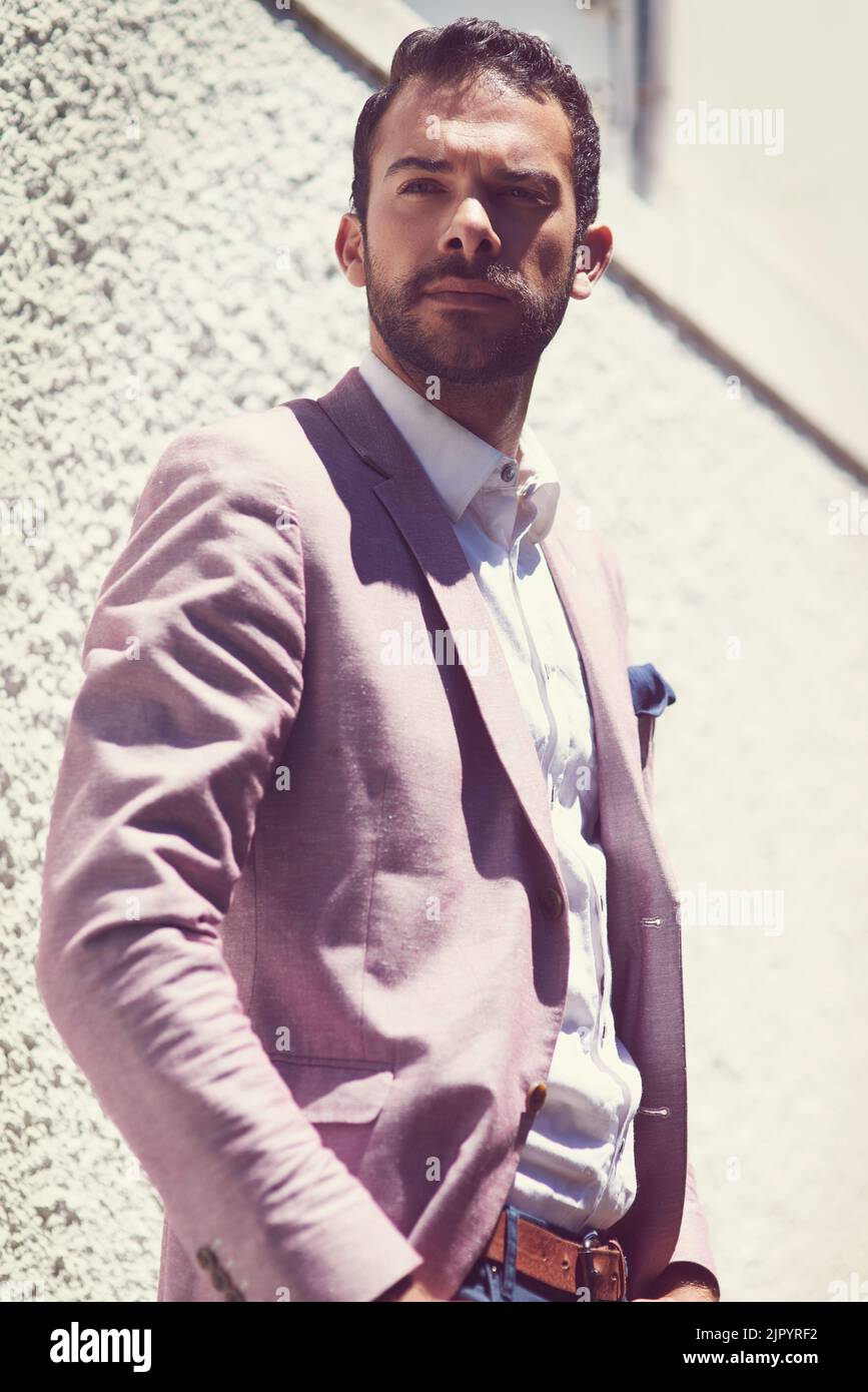 Dress well without trying. a well-dressed young man posing outside ... Dress well without trying. a well-dressed young man posing outside ...