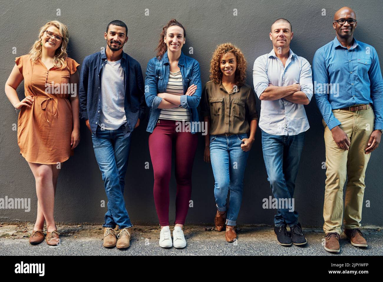 We each hold our own unique qualities. Portrait of a group of people ...