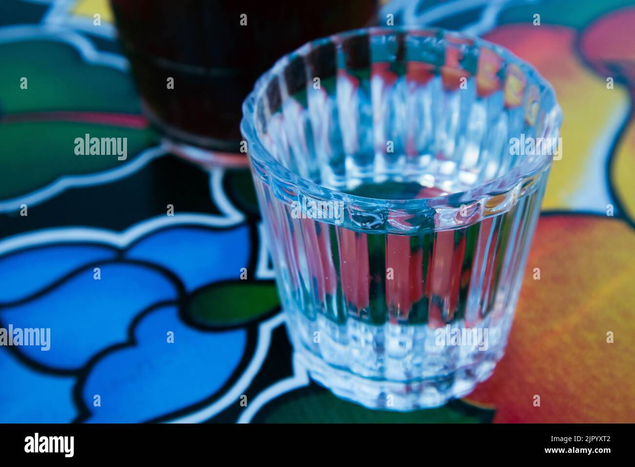 A glass of Mezcal on a table at a bar in Oaxaca City, Mexico Stock ...
