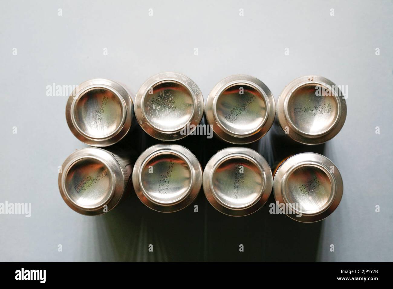 Group of cans for reuse and recycle. Empty cans botton view Stock Photo ...