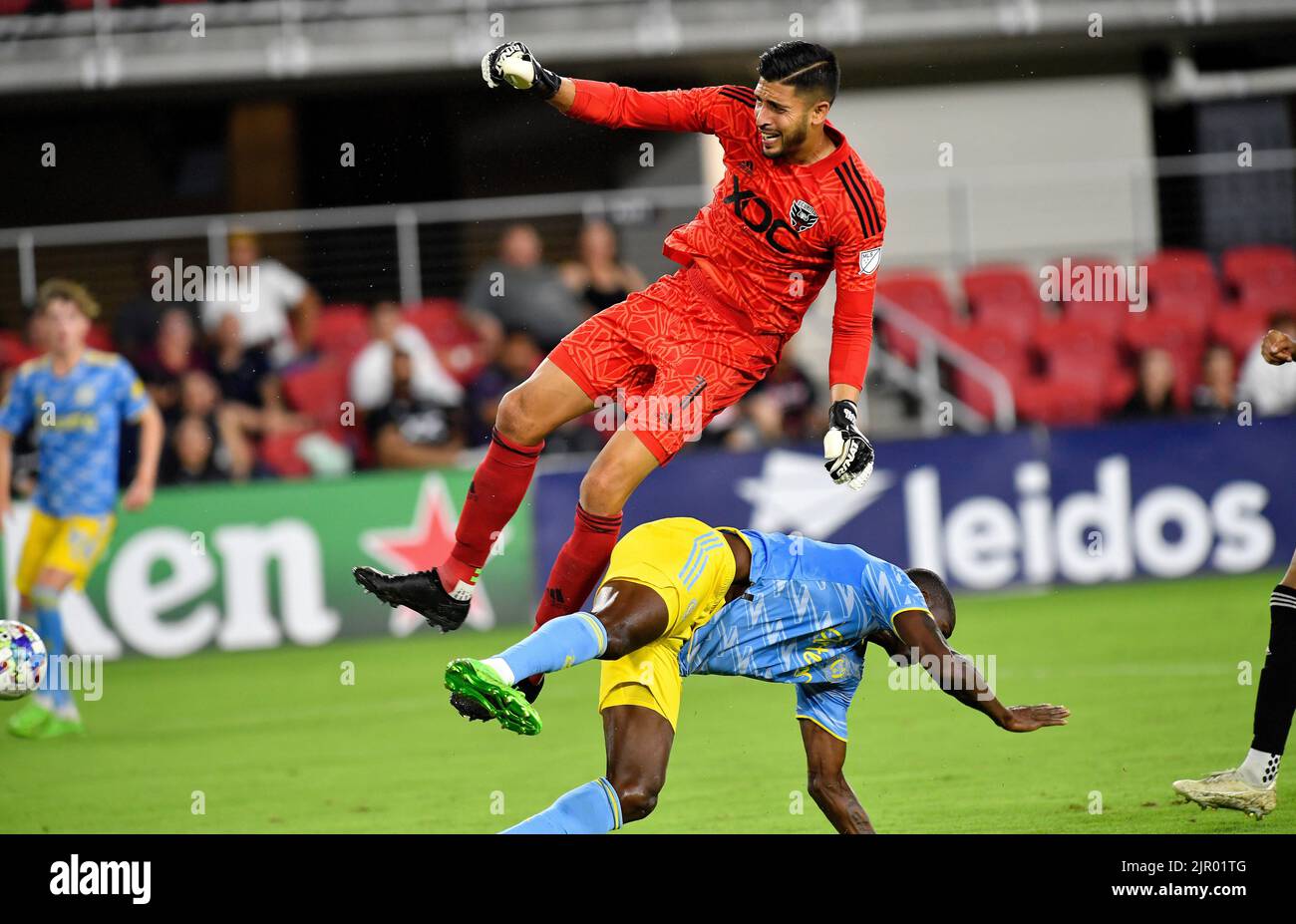 WASHINGTON, DC - AUGUST 20: DC United goalie Rafael Romo (1) collides ...