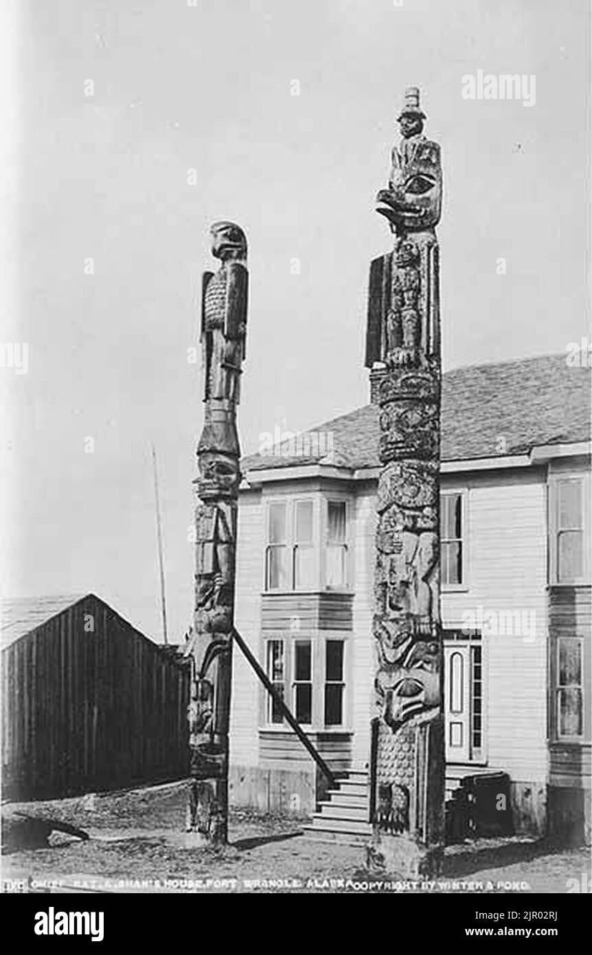 Tlingit totem poles in front of Chief Kat-A-Shan's house, Fort Wrangell ...