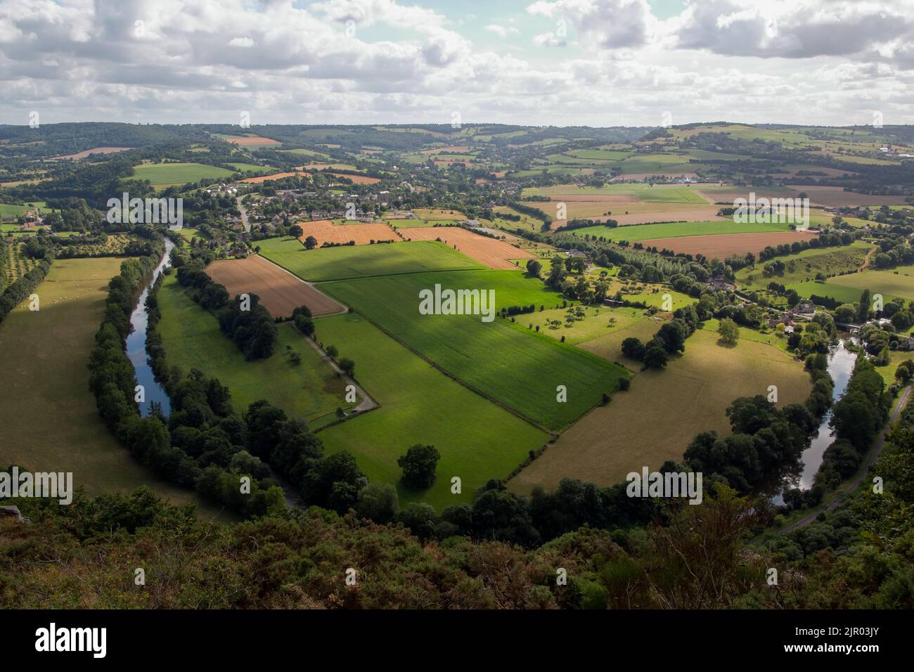 An aerial view of Clecy village with green fields, Swiss Normandy ...