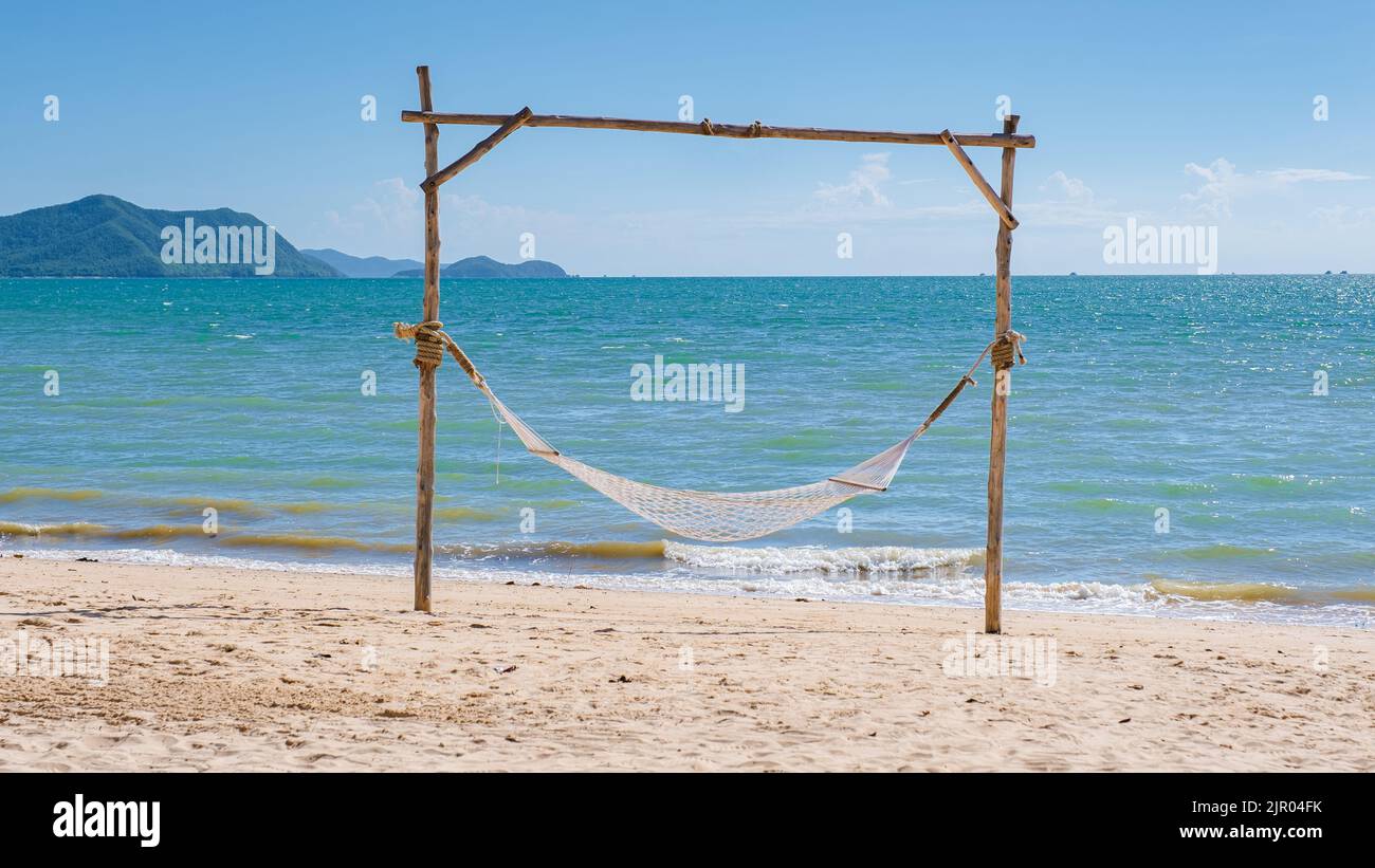 Hammock on the beach of Ban Amphur Beach Pattaya Thailand, a beach with ...