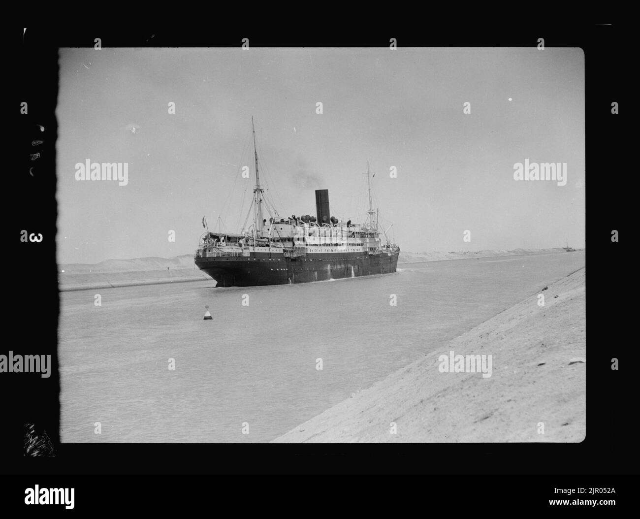 To Sinai by car. The Suez Canal. Steamship passing through Stock Photo ...
