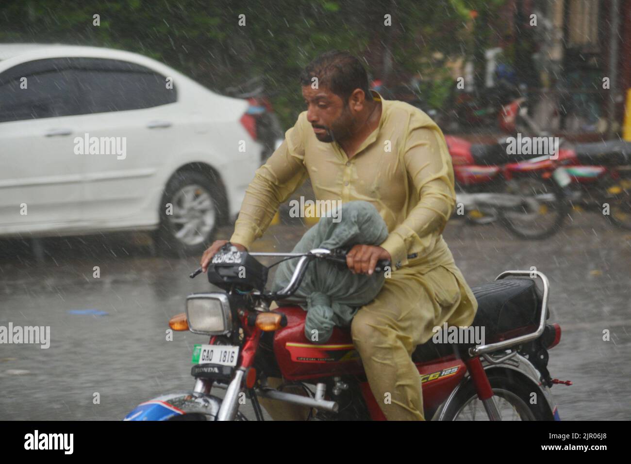 Lahore, Punjab, Pakistan. 20th Aug, 2022. Pakistani people on their way ...