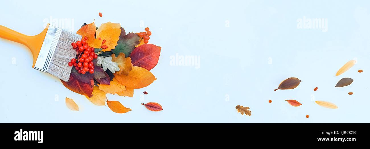 Creative top view flat lay autumn concept composition. Brush paint with ...