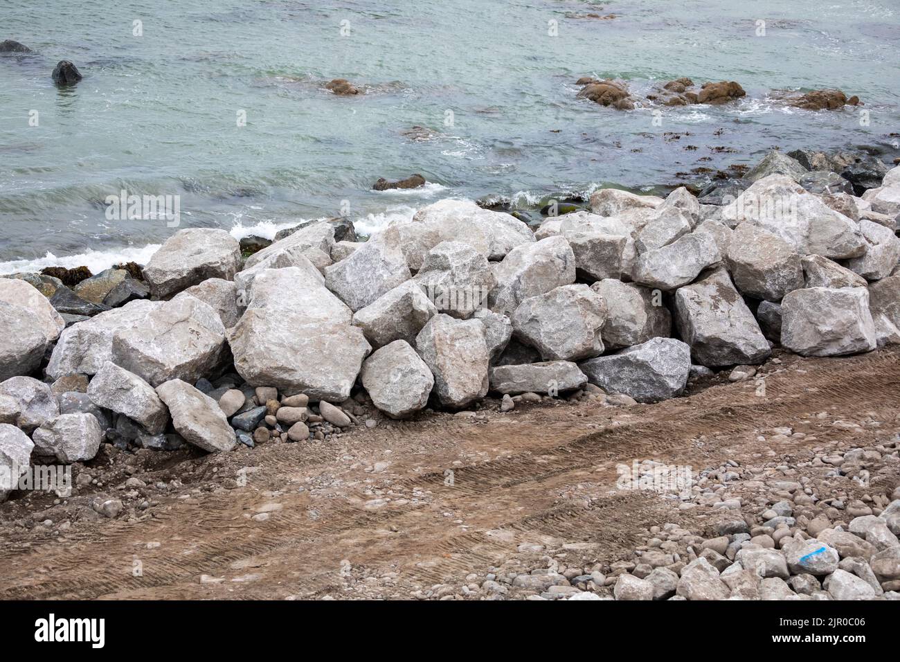 Sea defence rocks in Coverack, Cornwall, UK Stock Photo - Alamy