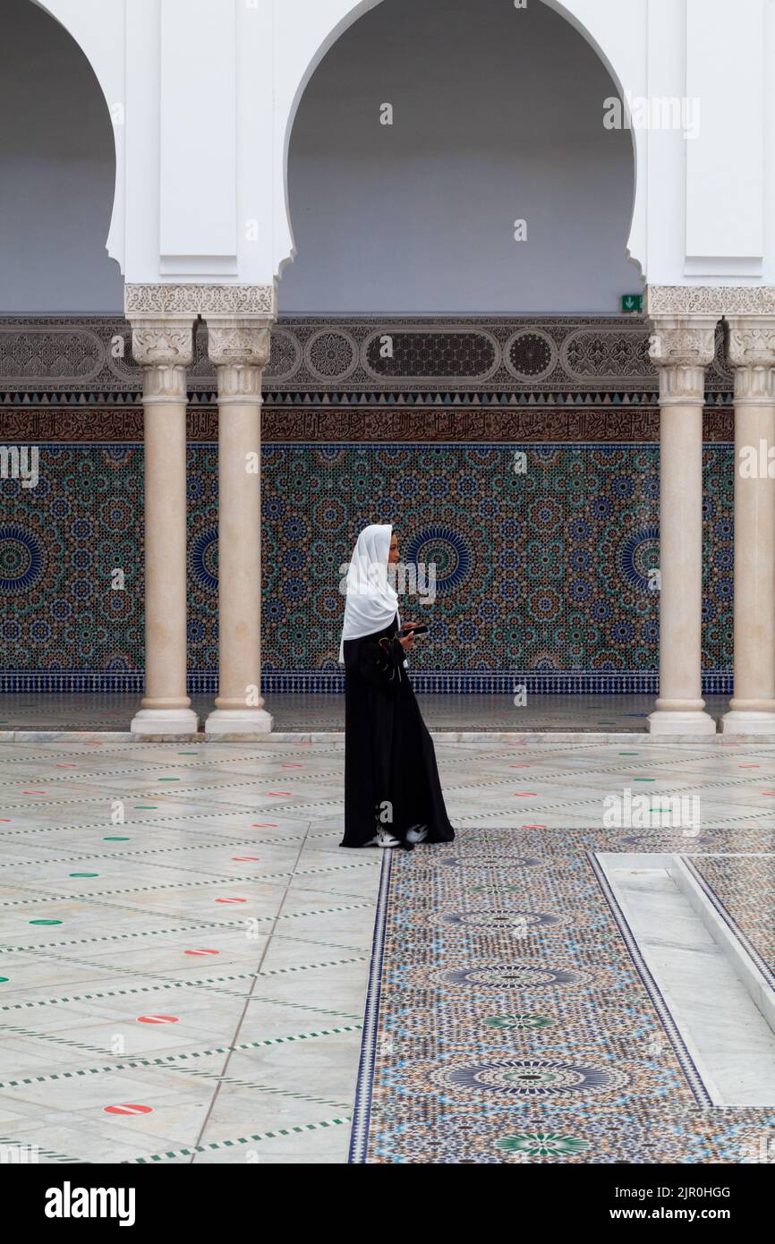 Paris, France - July, 14: Muslim girl wearing traditional dress in the ...