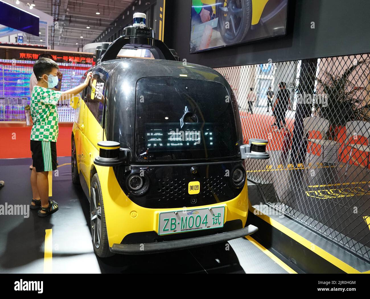 Beijing, China. 20th Aug, 2022. An unmanned delivery vehicle is on ...