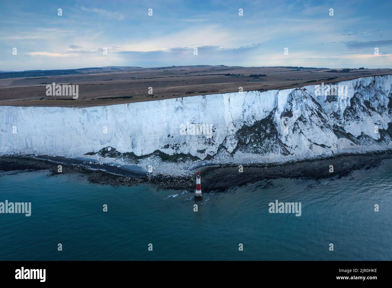 Beautiful Summer sunrise landscape image of Beachy Head Lighthouse in ...