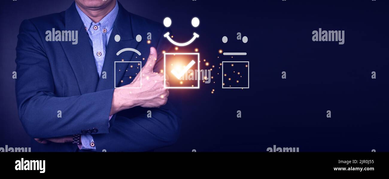 Customer service evaluation concept. smiling Asian male Is using a ...