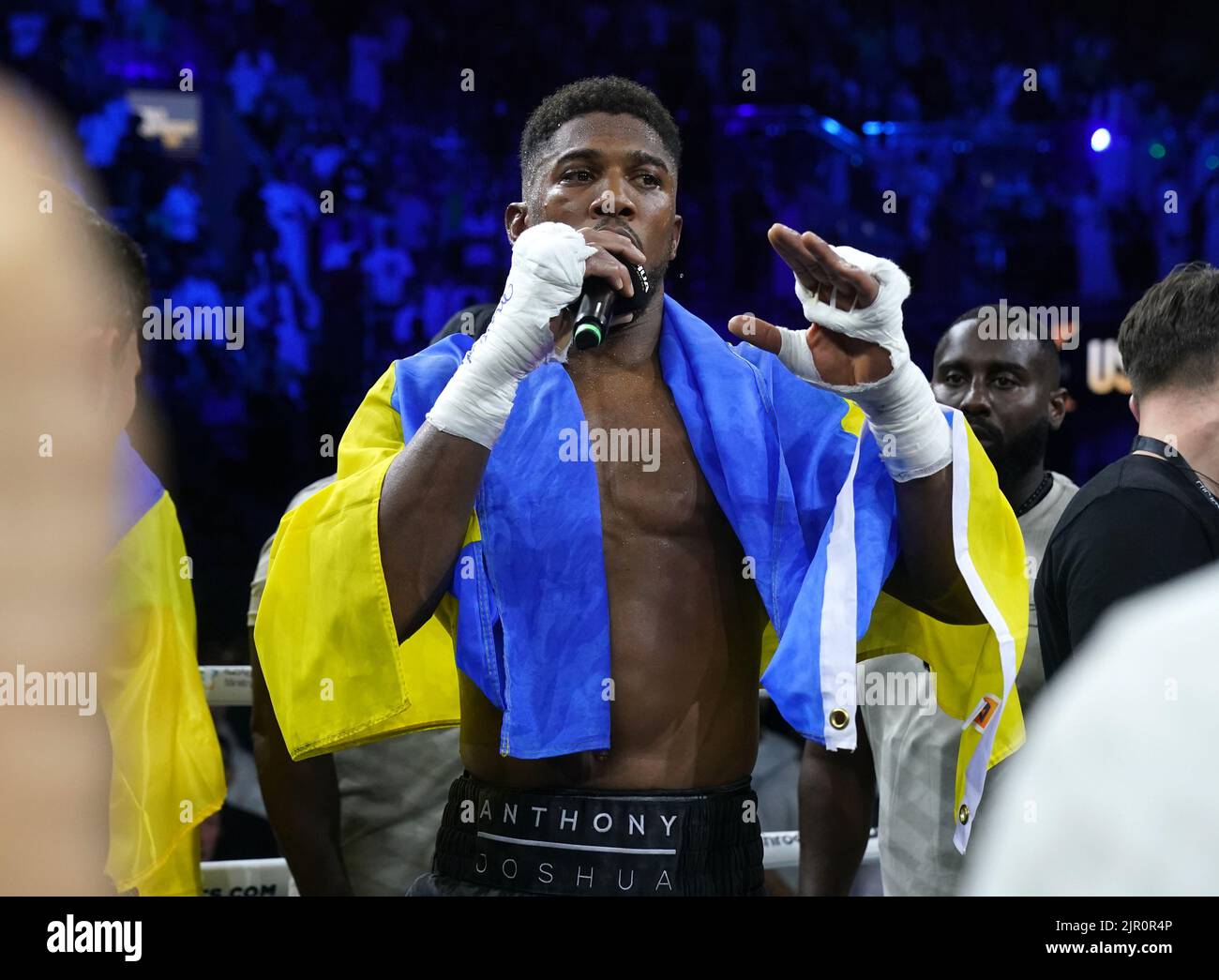 Anthony Joshua speaks to the crowd after losing the World Heavyweight Championship WBA Super IBF ...