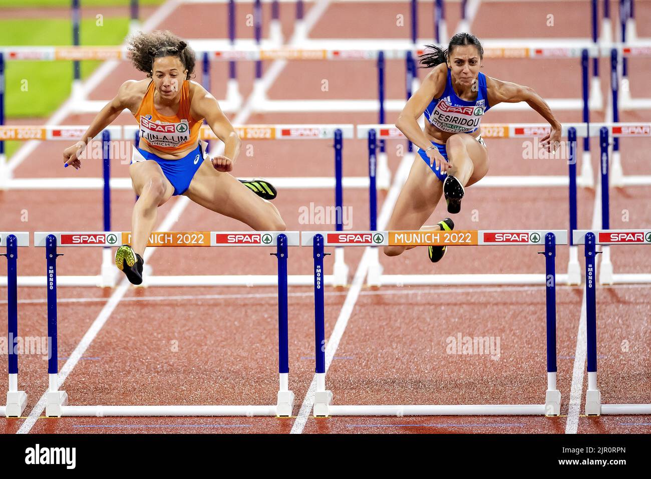 MUNICH - Maayke Tjin-a-Lim in action during the 100-meter hurdles on ...