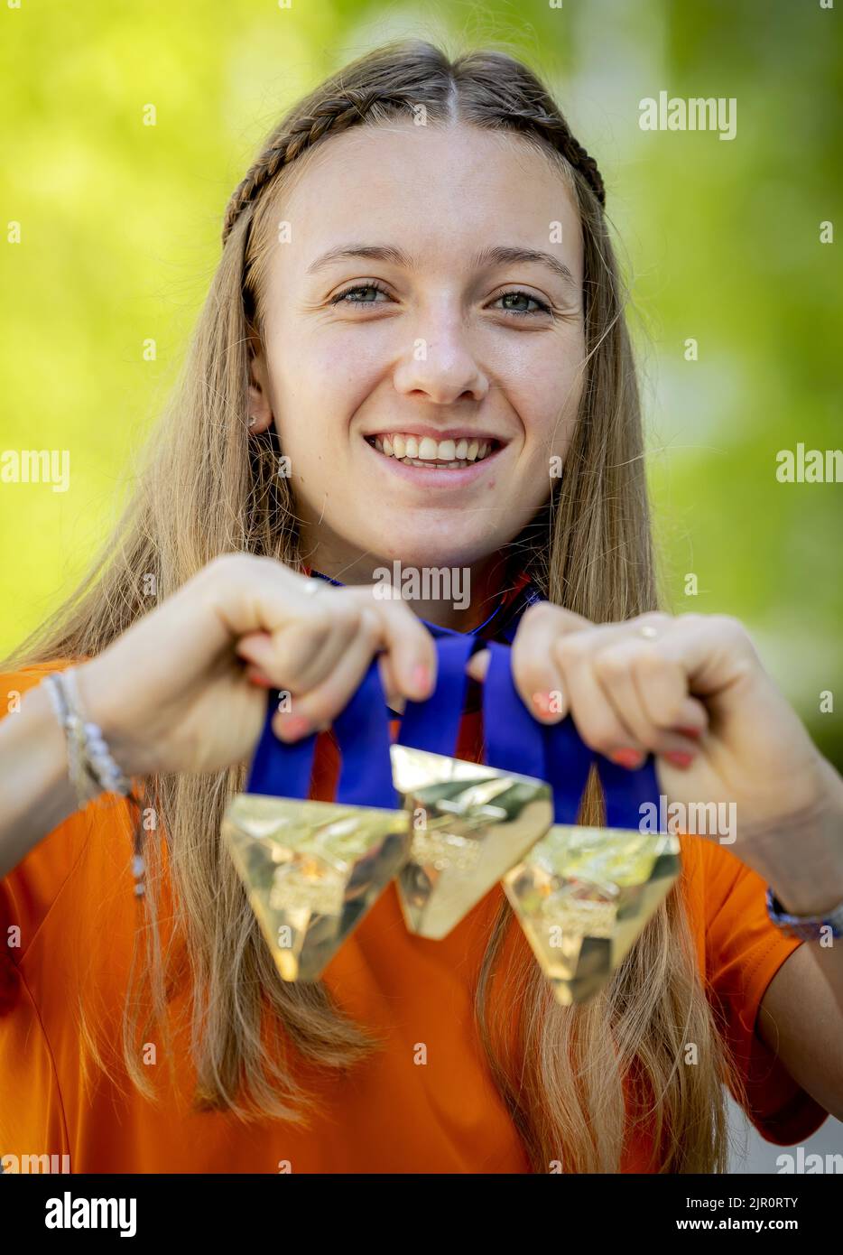 MUNCHEN - Portrait of Femke Bol with her three gold medals she won ...