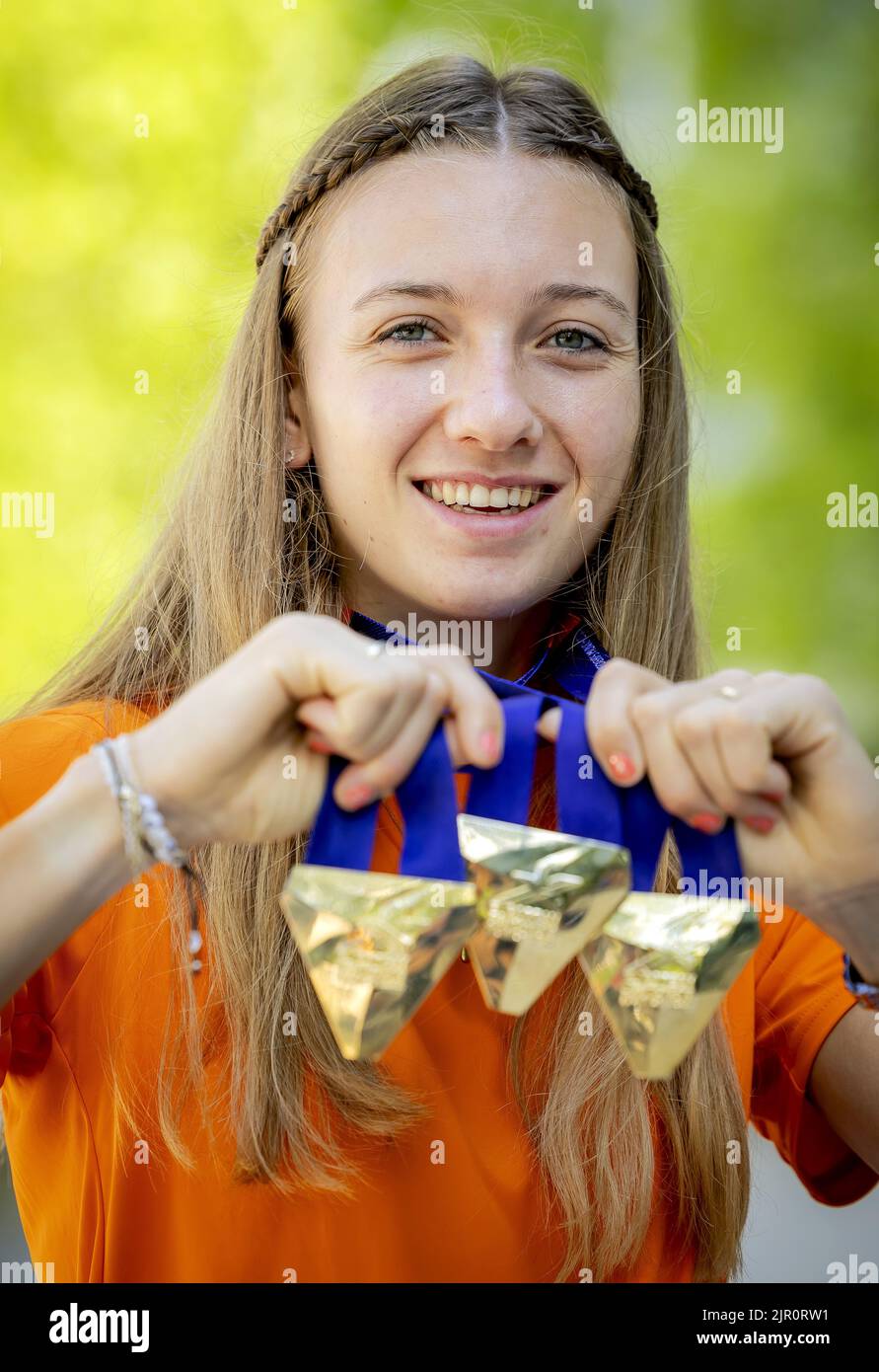 MUNCHEN - Portrait of Femke Bol with her three gold medals she won ...