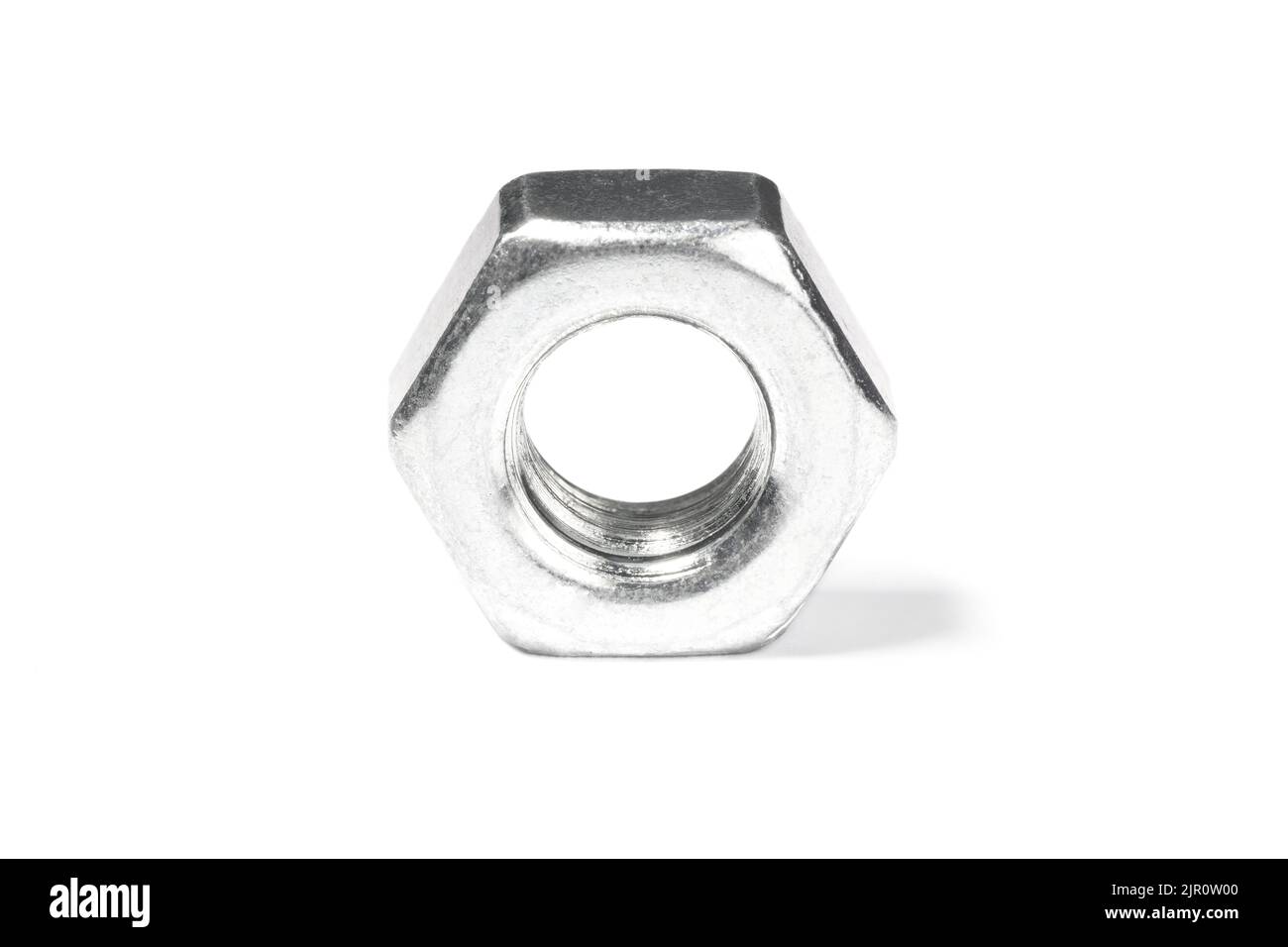Close-up of a hexagonal steel nut isolated on white background Stock ...