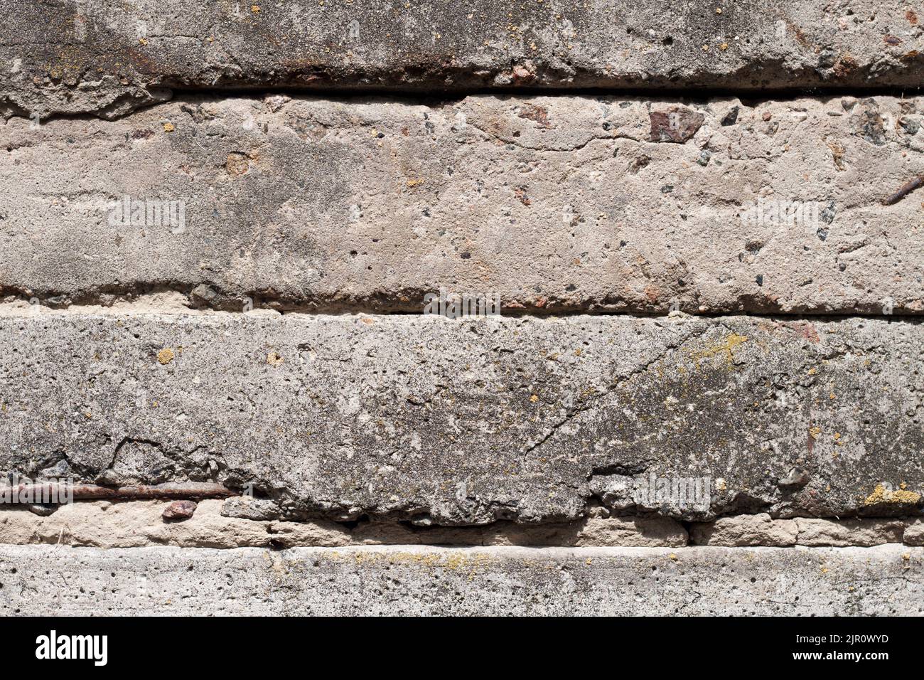 Old concrete blocks wall background closeup. Industrial background ...