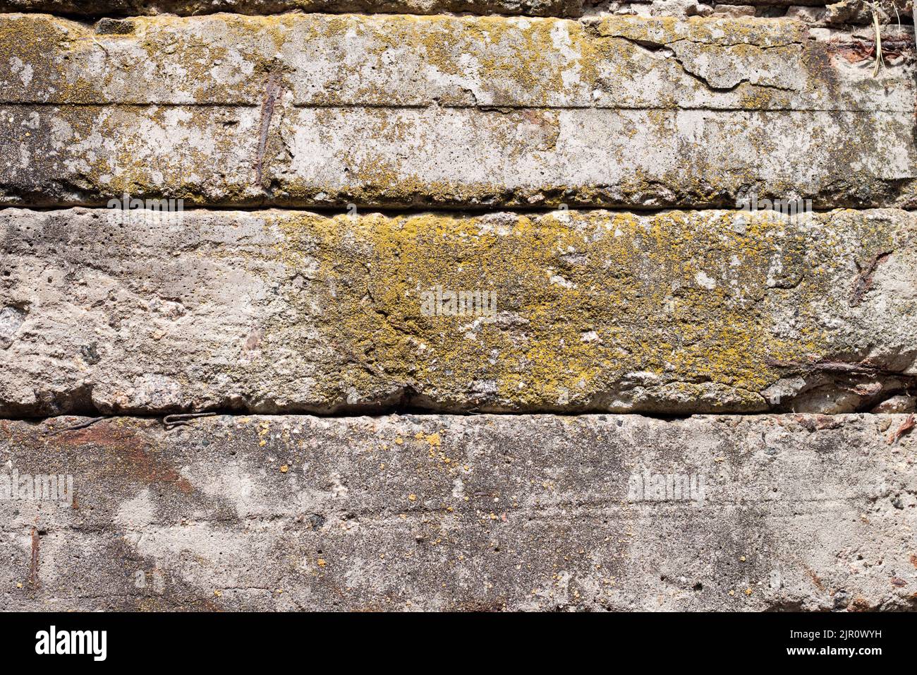Old concrete blocks wall background closeup. Industrial background ...