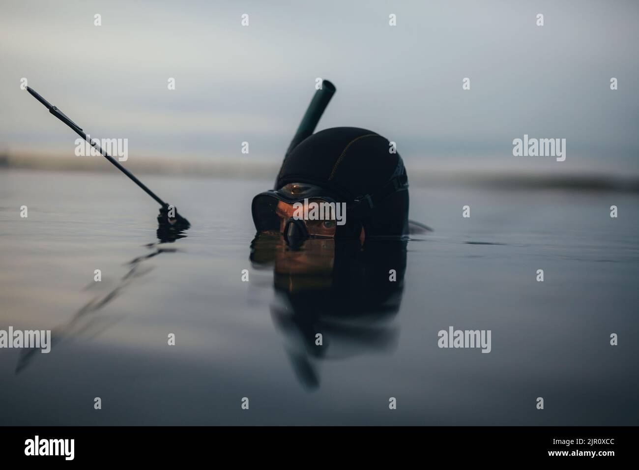 Male fisherman in wetsuit hi-res stock photography and images - Alamy