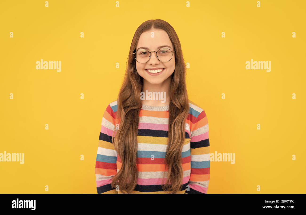 happy tween girl look through eyeglasses. vision acuity. eyesight ...