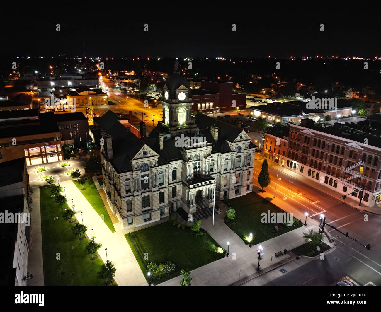 An aerial view of a governmental building with a clock tower at the ...