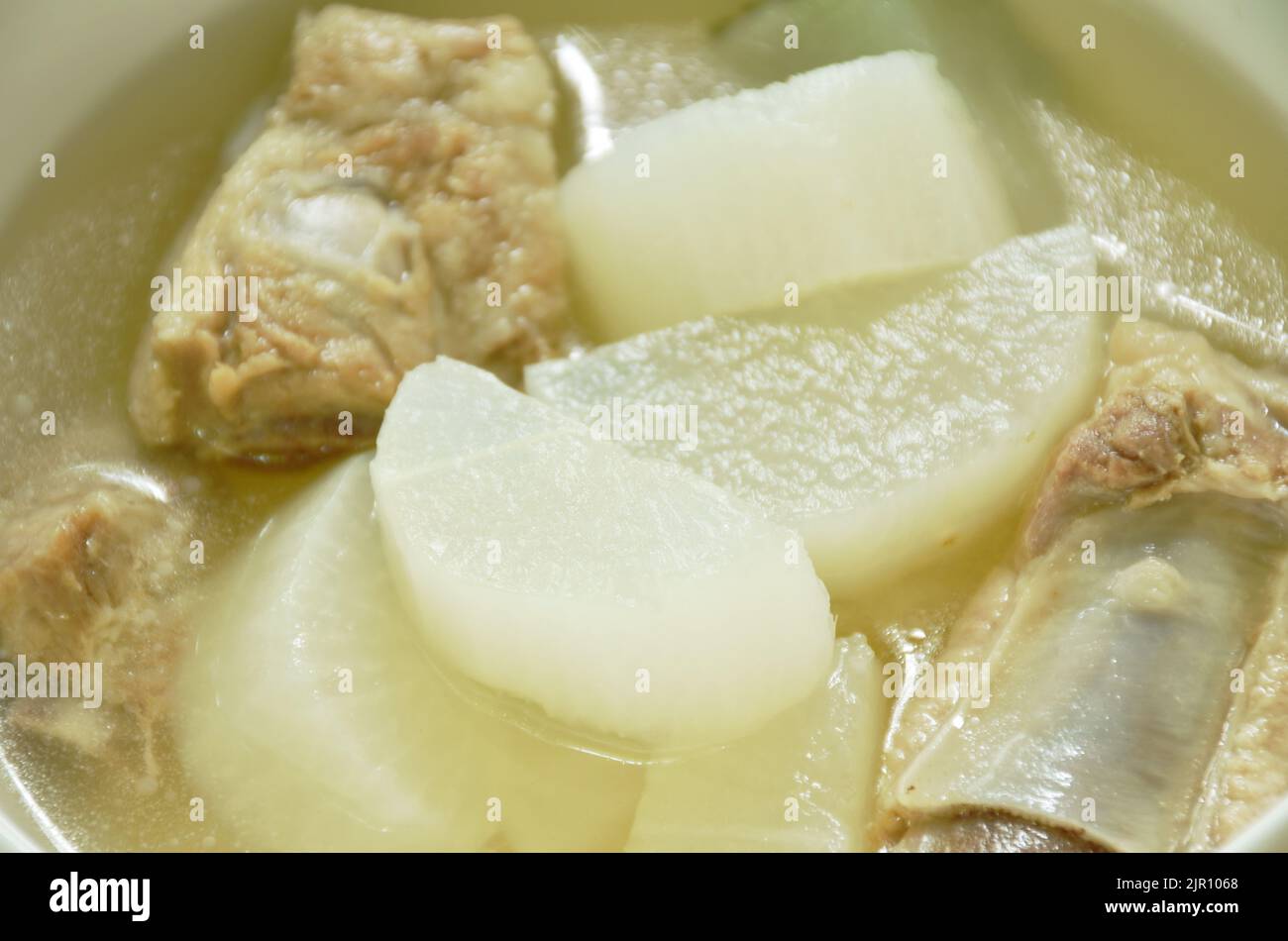 boiled slice radish with pork bone soup on bowl Stock Photo - Alamy