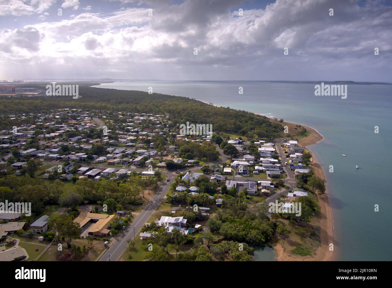 Aerial of residential houses along Lilley's Beach Boyne Island near ...