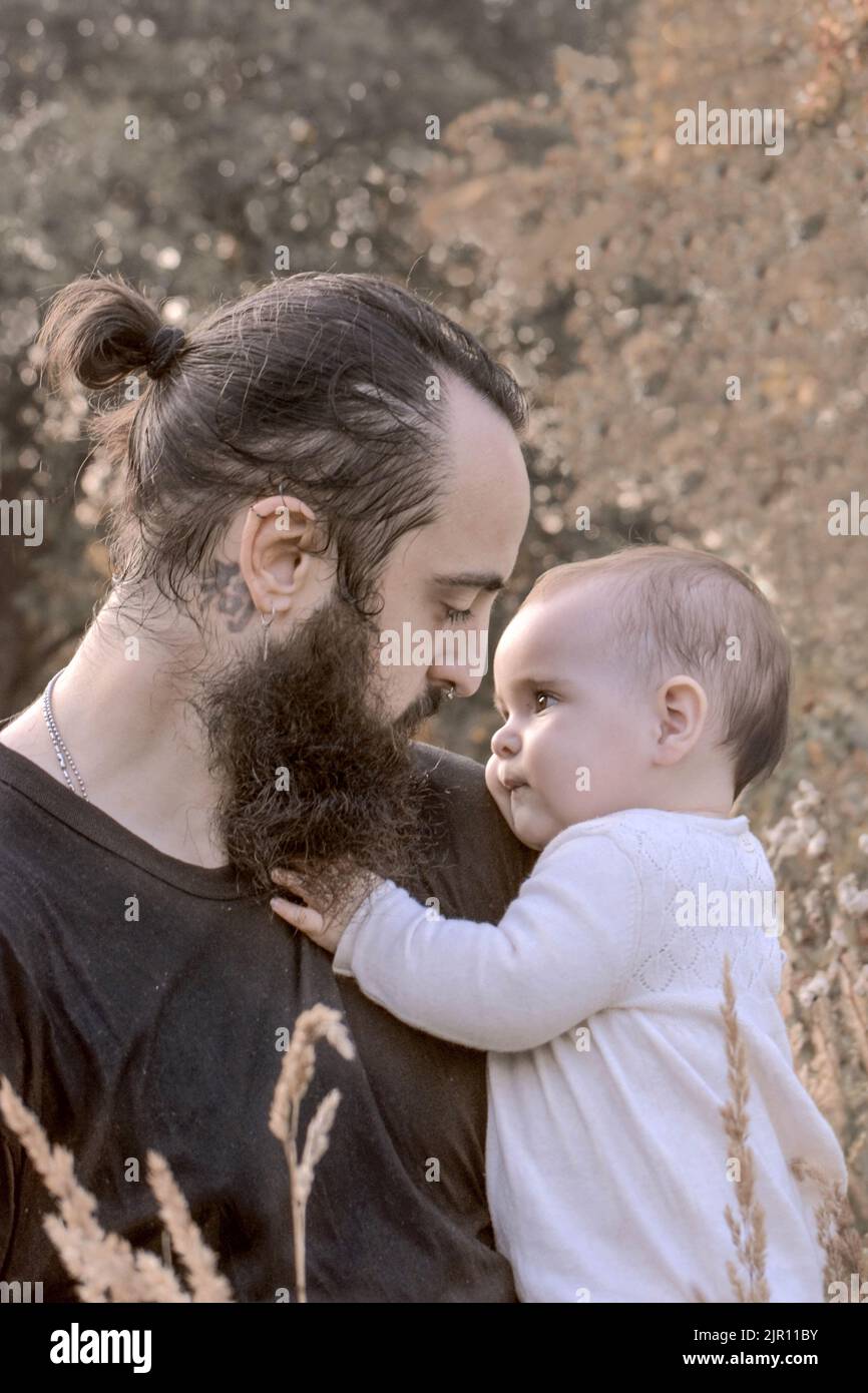 Baby staring at dad hi-res stock photography and images - Alamy