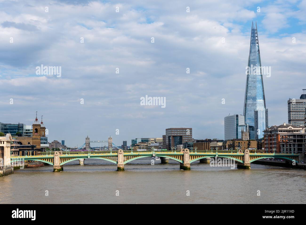 London, England: City skyline seen from the Millenium bridge, looking ...