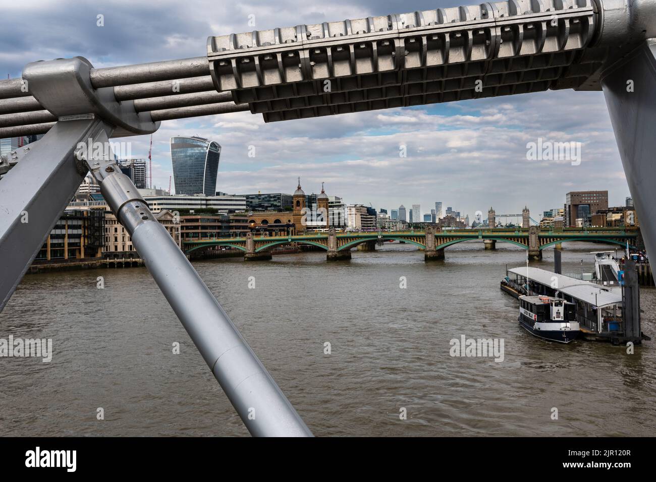 London, England: City skyline seen from the Millenium bridge, looking ...