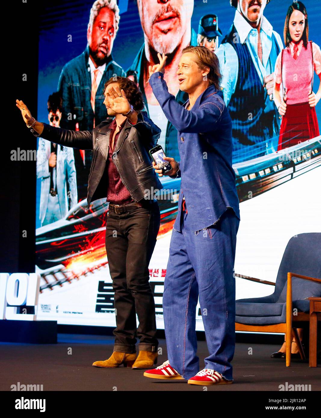 Brad Pitt and Aaron Taylor-Johnson, August 19, 2022 : Brad Pitt (R) and ...