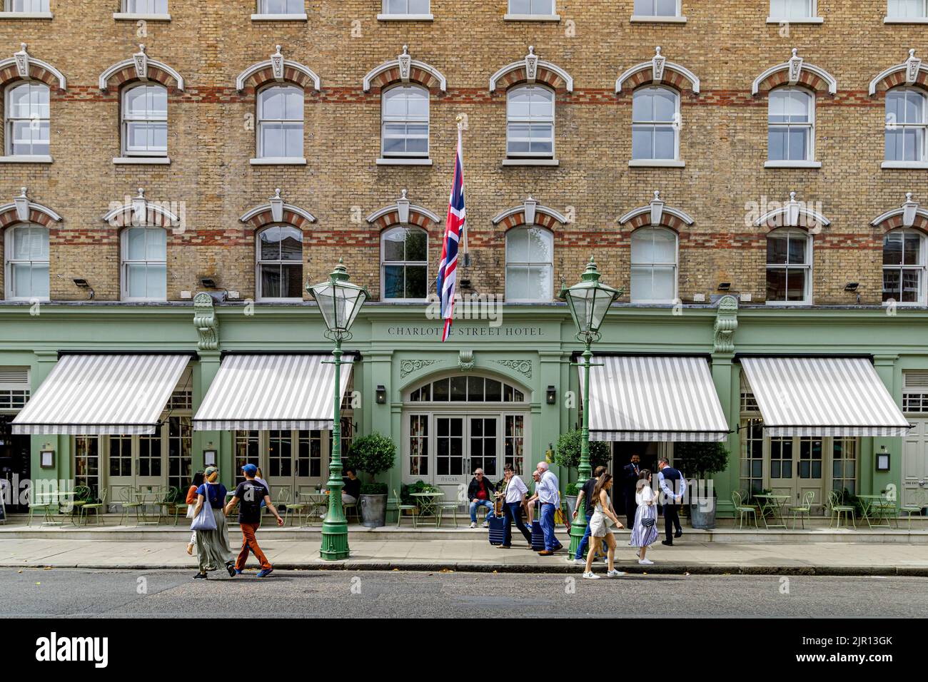 People walking past the entrance to the Charlotte Street Hotel ,on ...