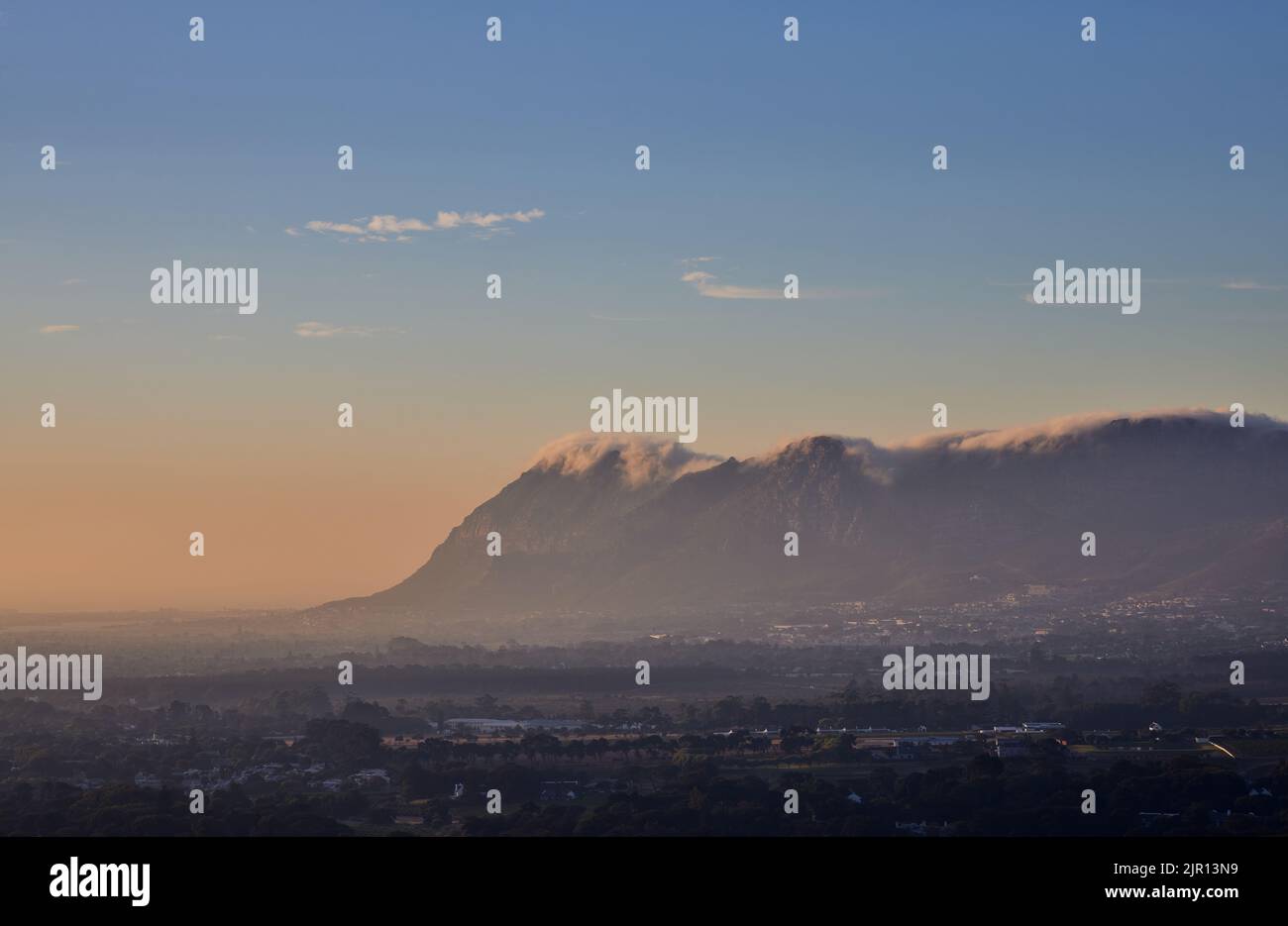 A stunning view of mountains during sunrise in Constantia South Africa ...