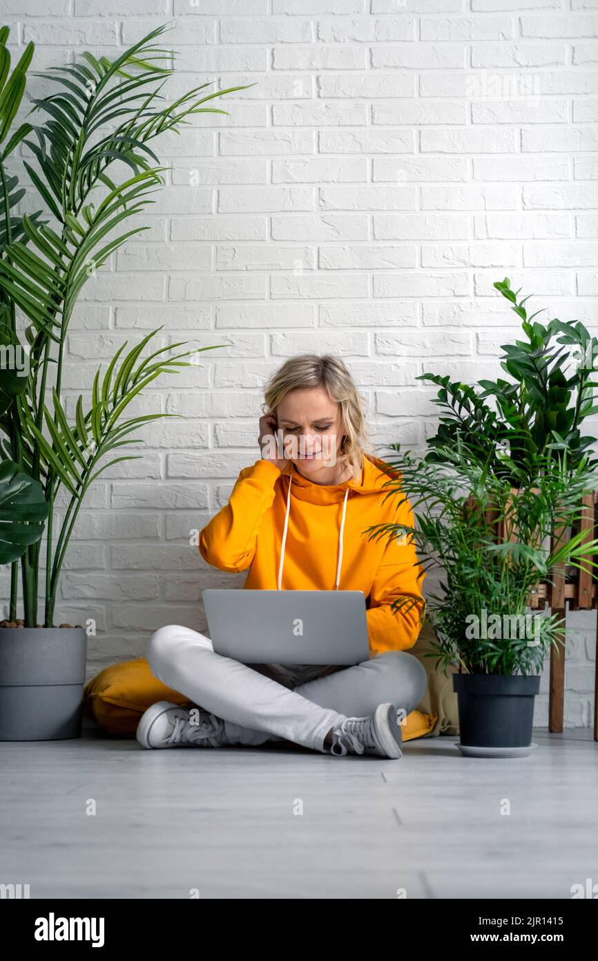 Woman girl using computer laptop working office work remotely from home ...