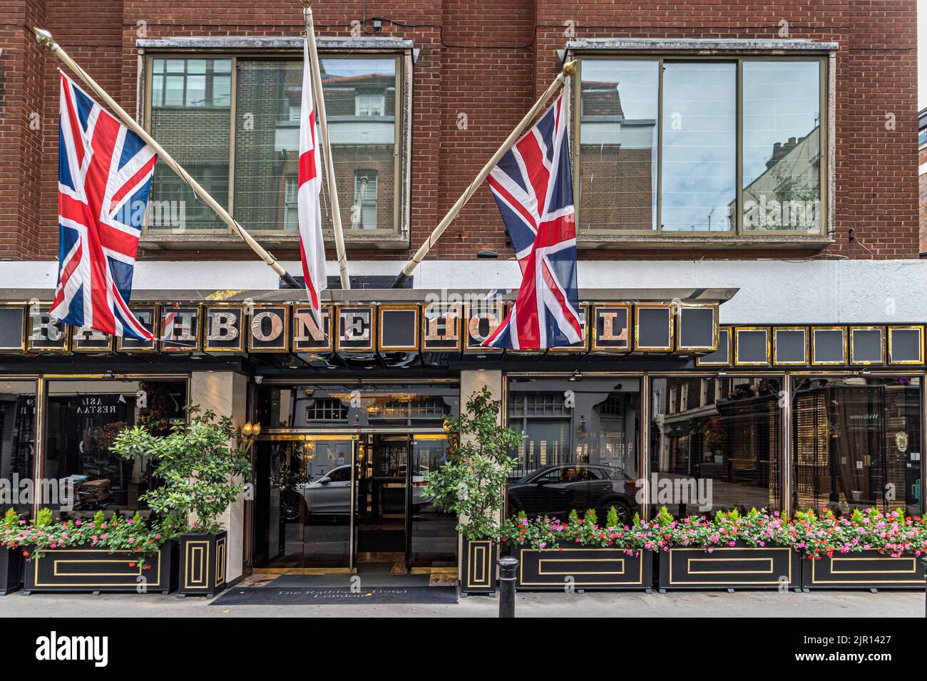 Union Flags displayed outside the front entrance to The Rathbone Hotel ...
