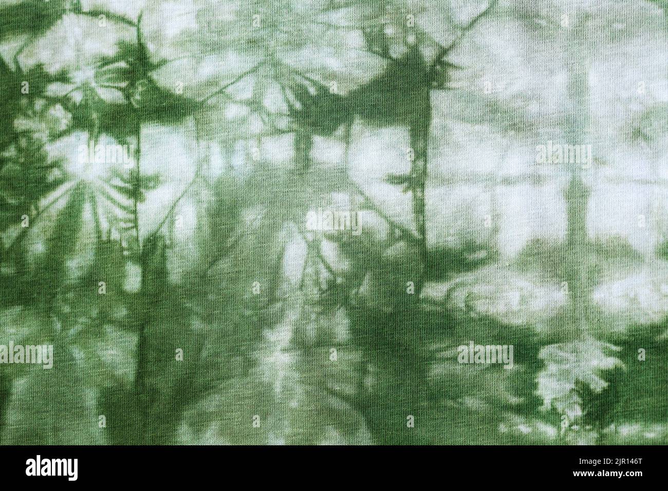 green abstract pattern handcrafted in tie dye technique on cotton ...