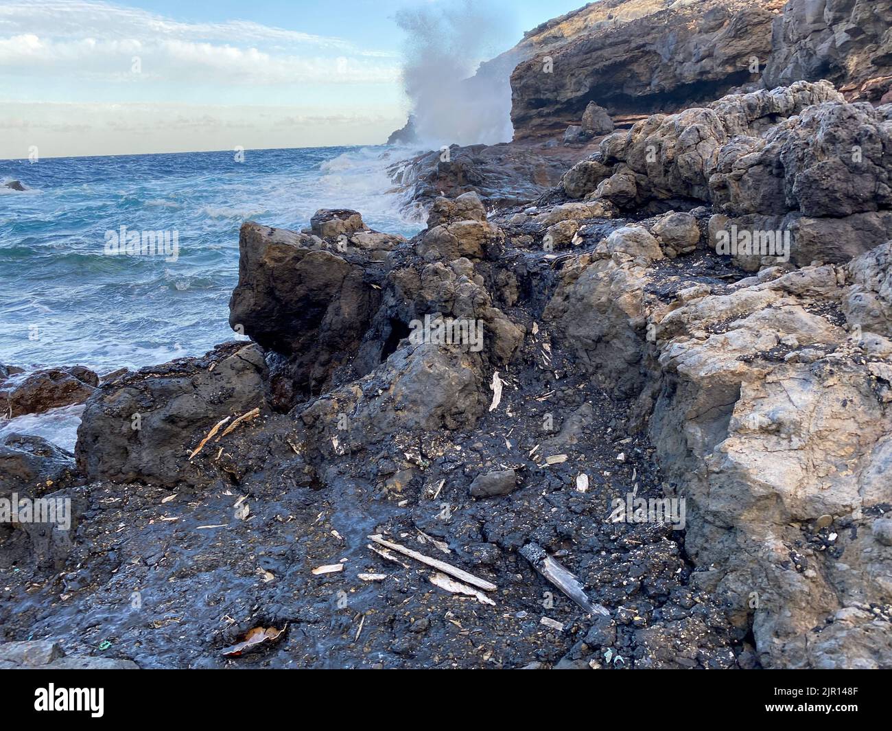 A view of tar oil polluted sea coastline in Tenerife Stock Photo - Alamy