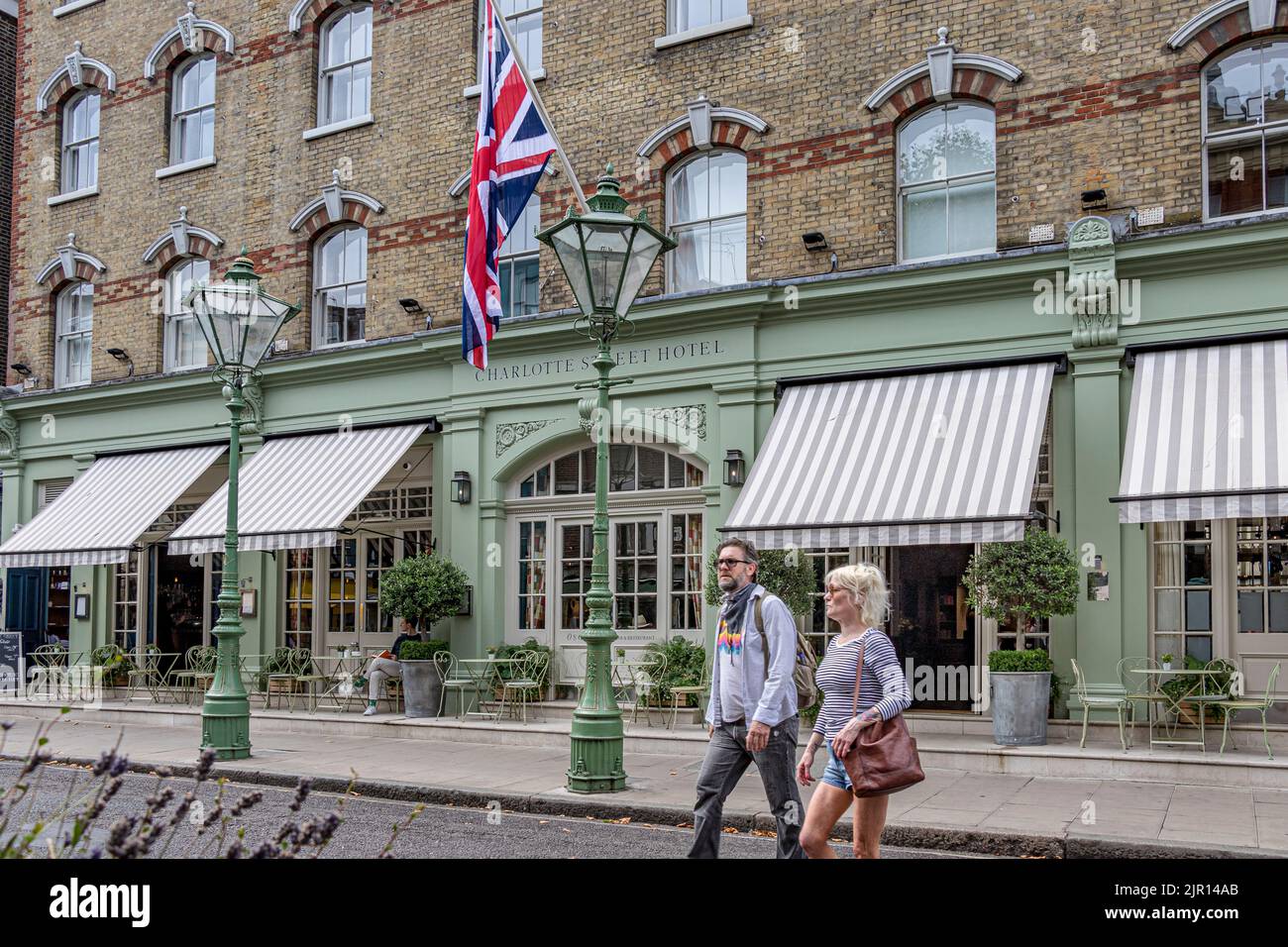 People walking past the entrance to the Charlotte Street Hotel ,on ...