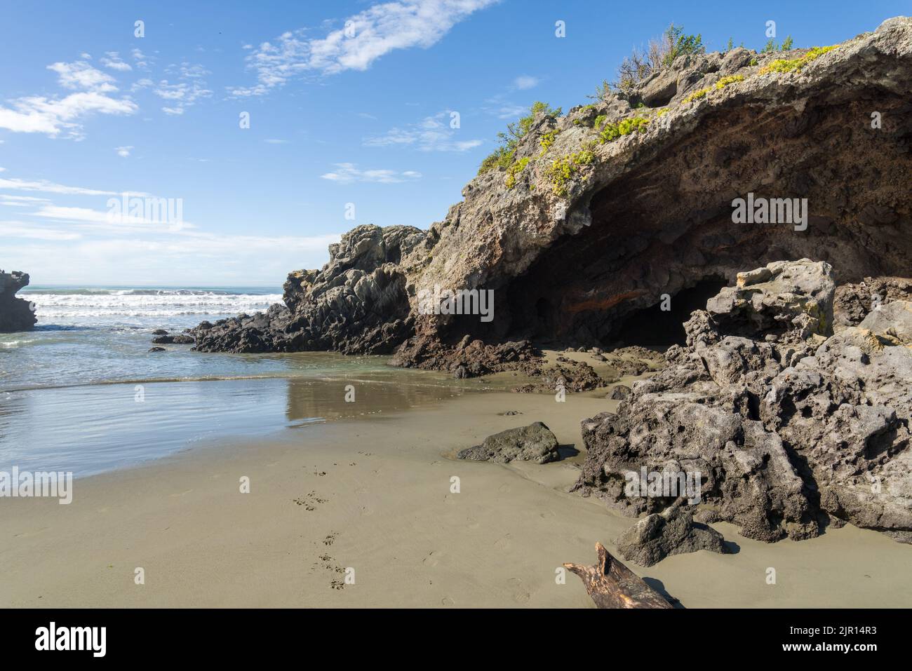 Cave rock Sumner Christchurch New Zealand Stock Photo - Alamy