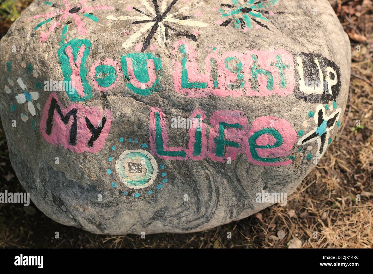 You light up my life painted on a rock as an inspirational message ...