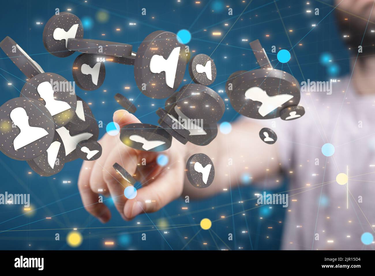 A man tapping a floating 3D-rendered human icons Stock Photo - Alamy