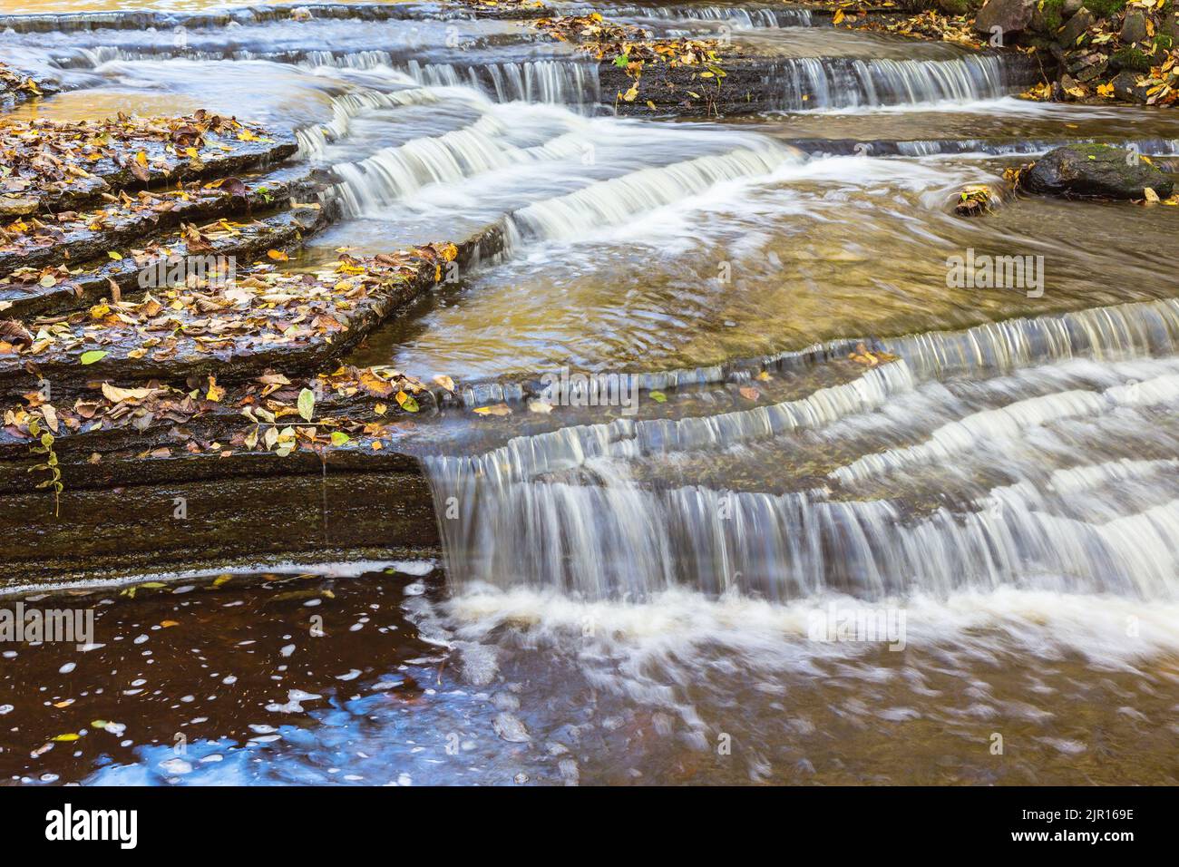 River flowing over shale rocks Stock Photo - Alamy